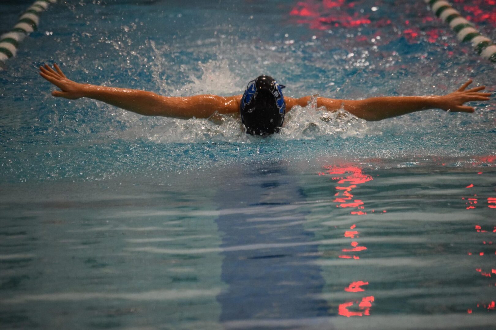 Swim Team dives and conquers - Hometown Weekly
