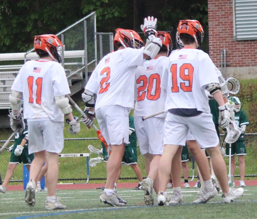 Boys’ lacrosse wins final regular season game - Hometown Weekly